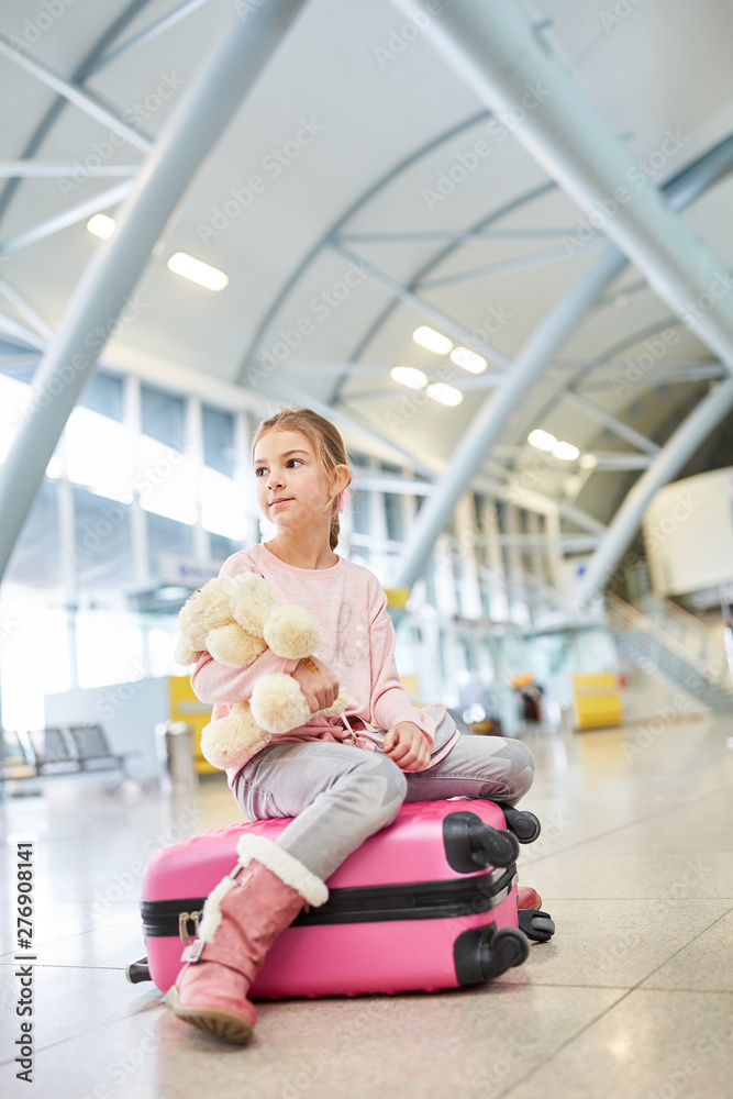 Alone traveling child is waiting for departure in the terminal Stock ...