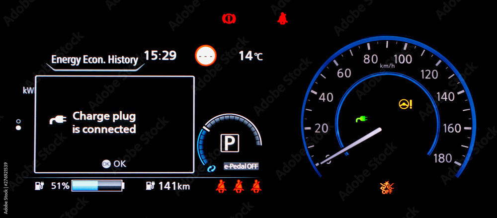 Electric car dashboard panel during charging battery. Modern digital ...