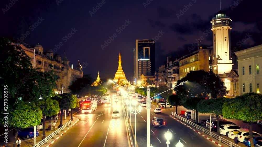 Streets of downtown Yangon on the road to Sule Pagoda timelapse with ...