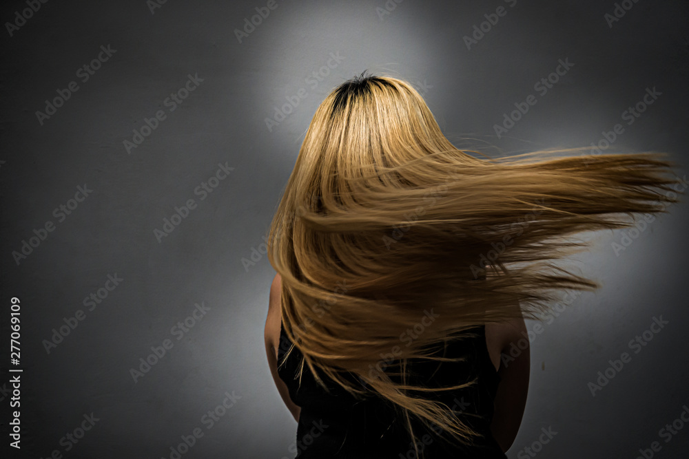 Texture of damaged female hair swing close-up. concept weak hair from ...