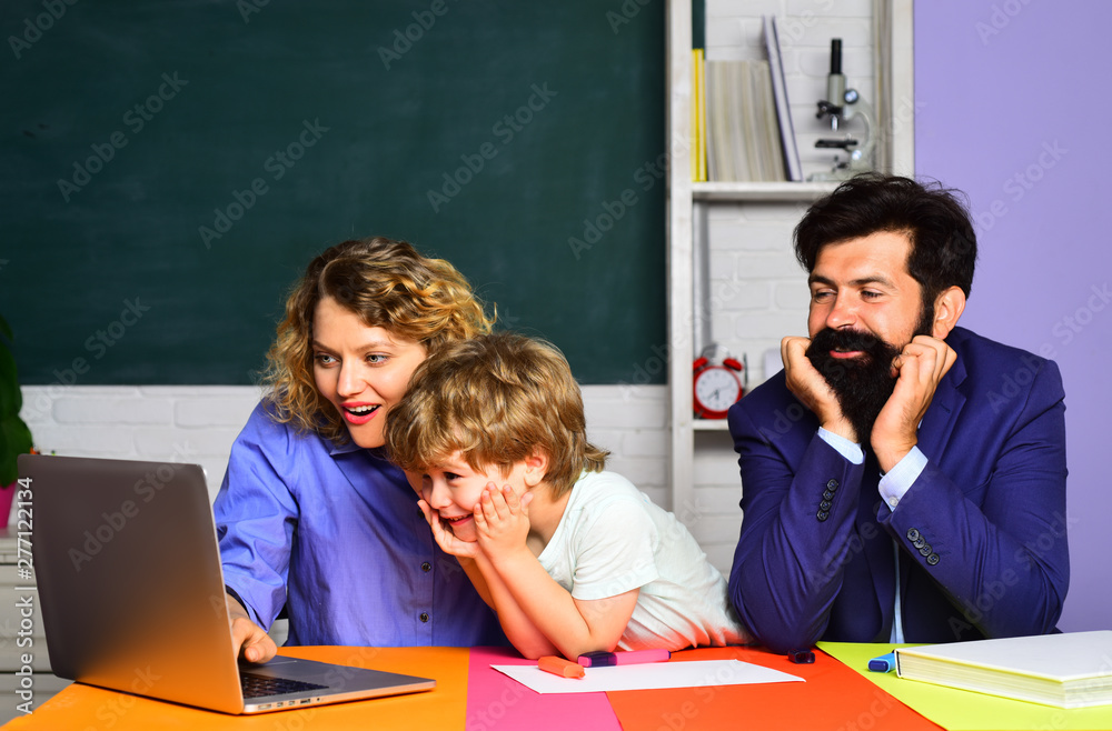 School boy in first grade. Family school. Parents teaching son. Little ...