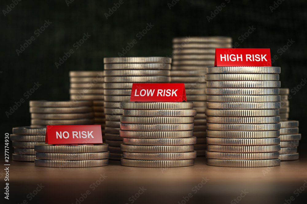 Investment and level of risk concept. Coins of dollar and no risk, low ...