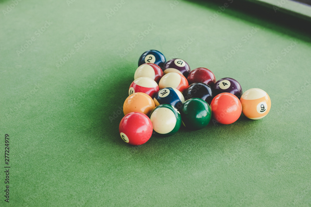 billiards balls triangle on a table green synthetic textured smooth ...