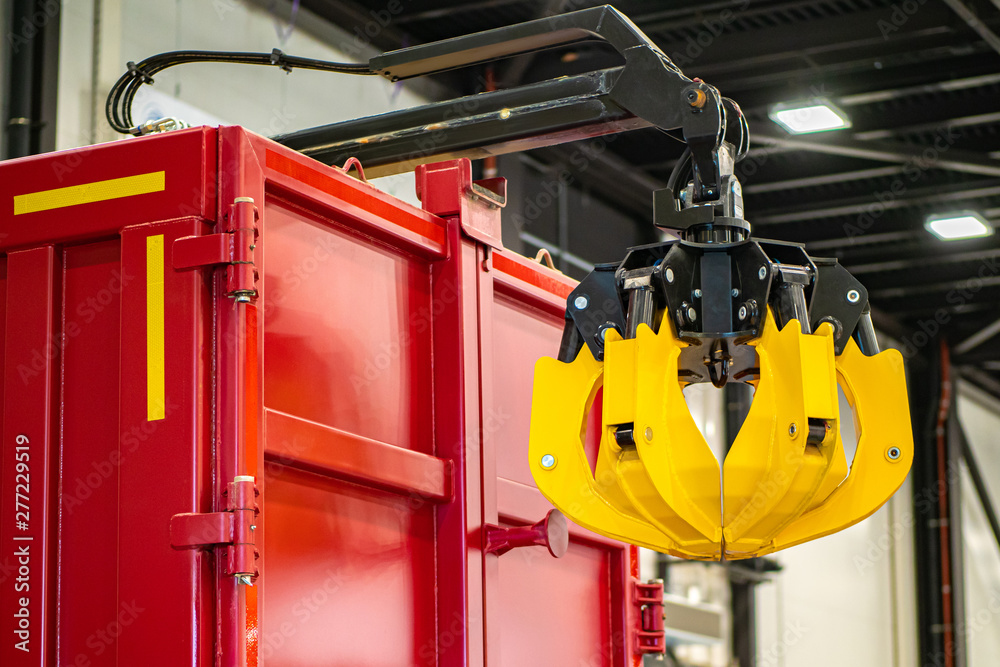 Garbage truck with manual hydraulic manipulator. Crane manipulator with ...