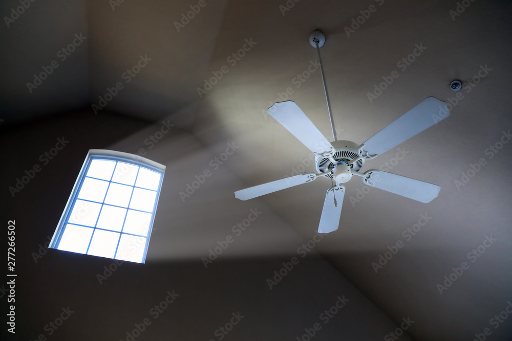 interior of house with close up ceiling fan and window Stock Photo ...