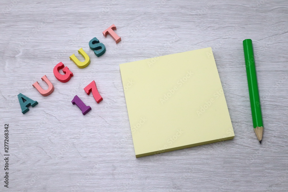 August 17 - Daily colorful Calendar with Block Notes and Pencil on wood ...