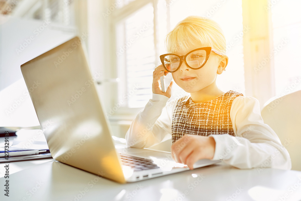 Girl as a business woman at the business computer Stock Photo | Adobe Stock