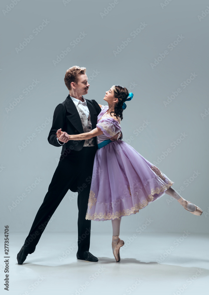 Moving together. Beautiful contemporary ballroom dancers isolated on ...