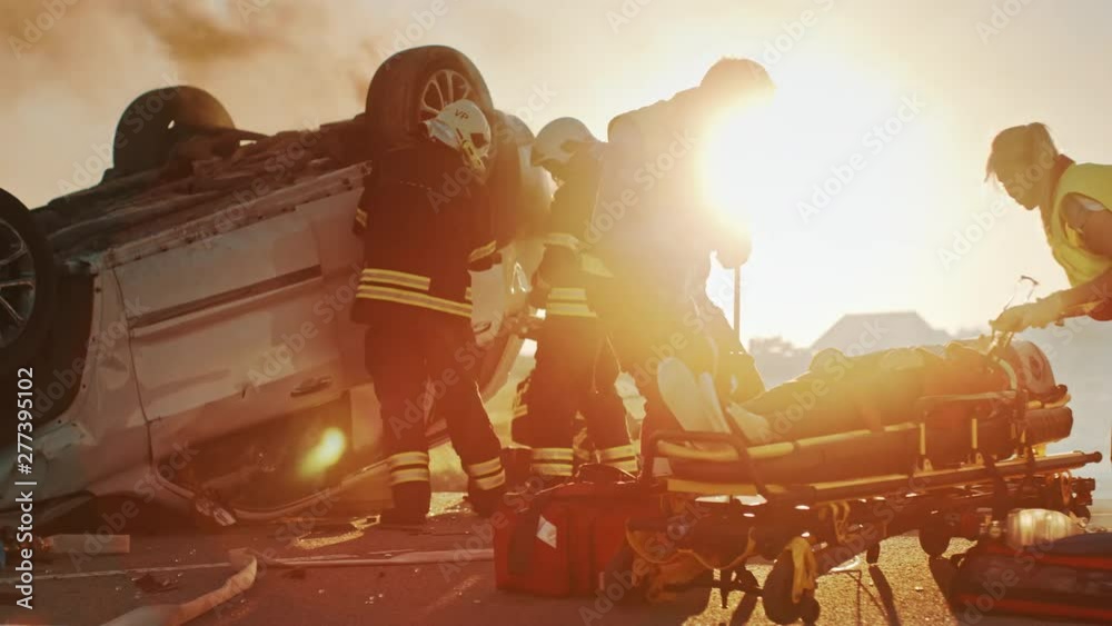 On the Car Crash Traffic Accident Scene: Paramedics Save Life of a ...