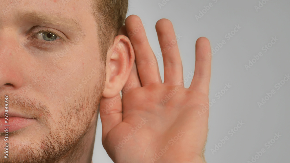 close up part of face young man with beard red hair posing showing hand ...