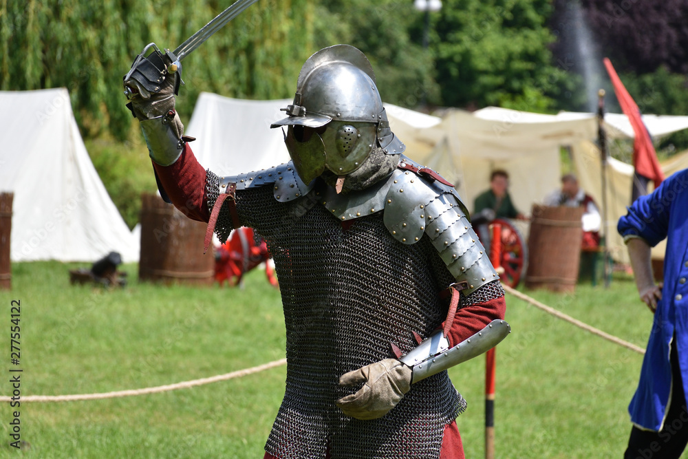 Fight of medieval Polish knights with sabres. Historical reenactment in ...