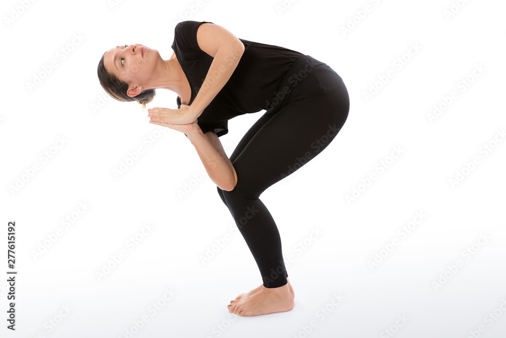Parivrtta Utkatasana Pose (Chair twist pose). Yoga poses woman isolated ...