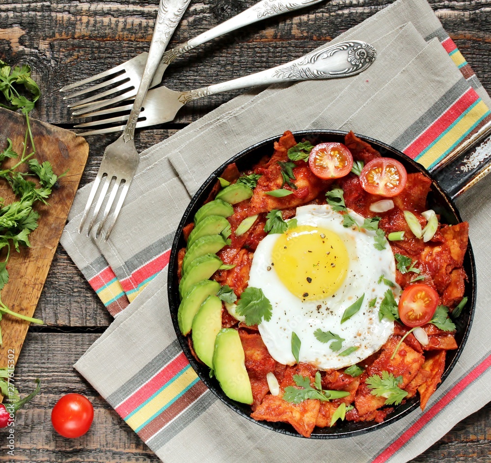 mexican breakfast Chilaquiles . tortilla chips are lightly stewed in a ...