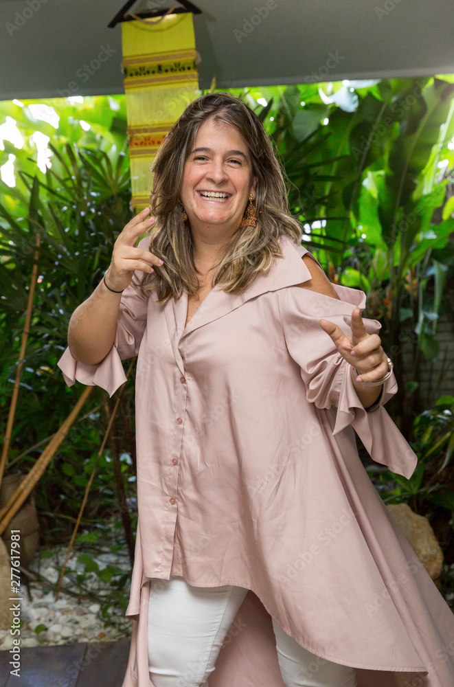 Fat girl happy isolated dancing expressing her achievement and joy ...