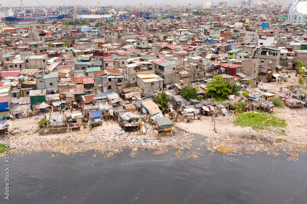 Slums in Manila, a top view. Sea pollution by household waste. Plastic ...