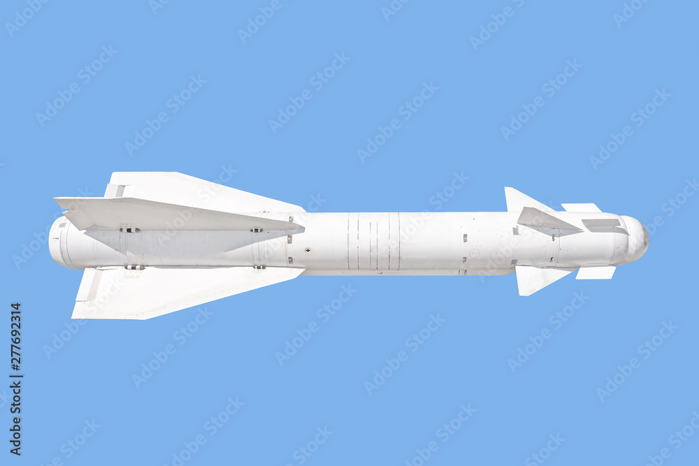 white modern missile isolated on blue sky background side view of ...