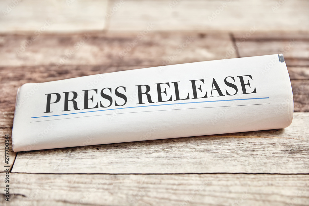 Press Release as a headline in a newspaper Stock Photo | Adobe Stock