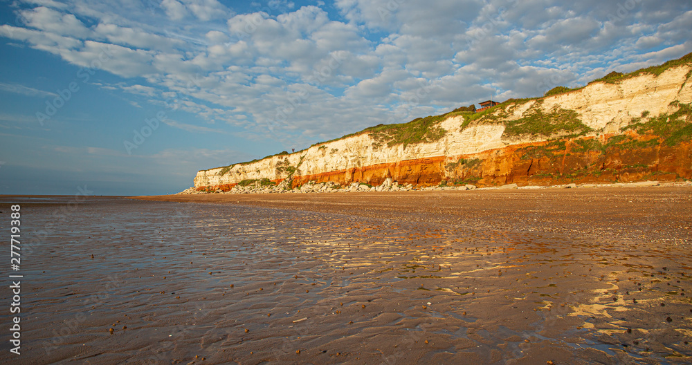The famous red and white chalk cliffs of Hunstanton in Norfolk, England ...