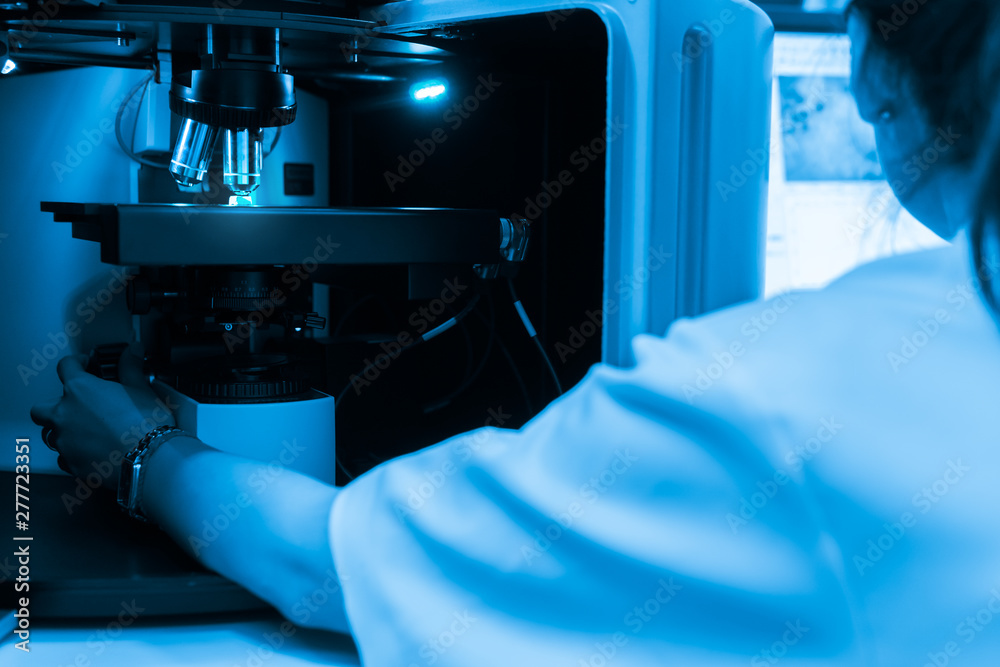 Asian scientist working in the lab,Experiment for customer,Using the ...