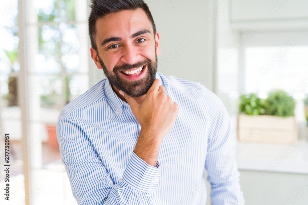 Handsome man smiling cheerful with a big smile on face showing teeth ...