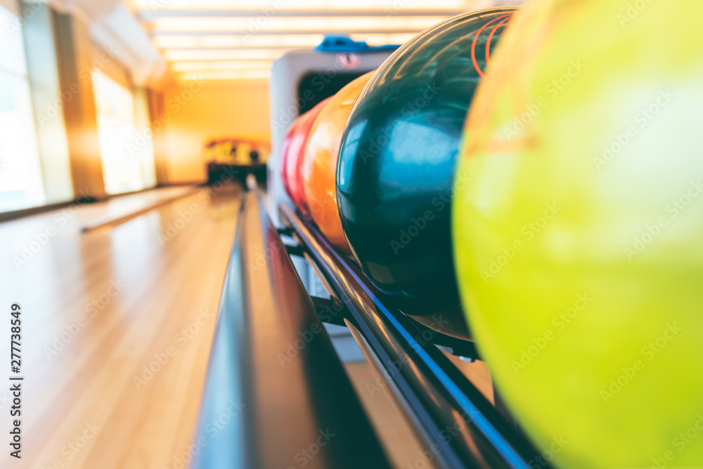 Blurred soft images of Bowling ball on the track prepared for athletes ...