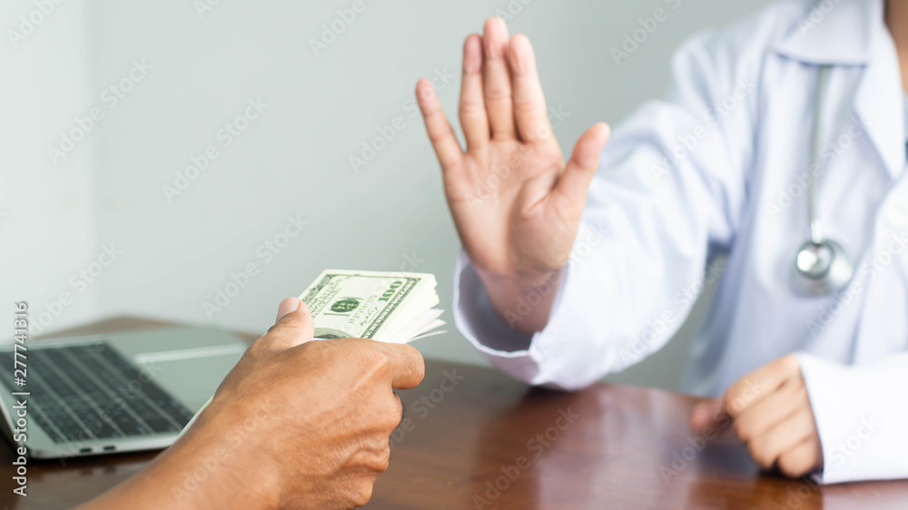 The patient's hand is sending money to the doctor for bribery in ...