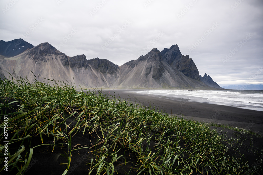 Stokksness beach with black sand and Vesturhorn mountains Stock Photo ...