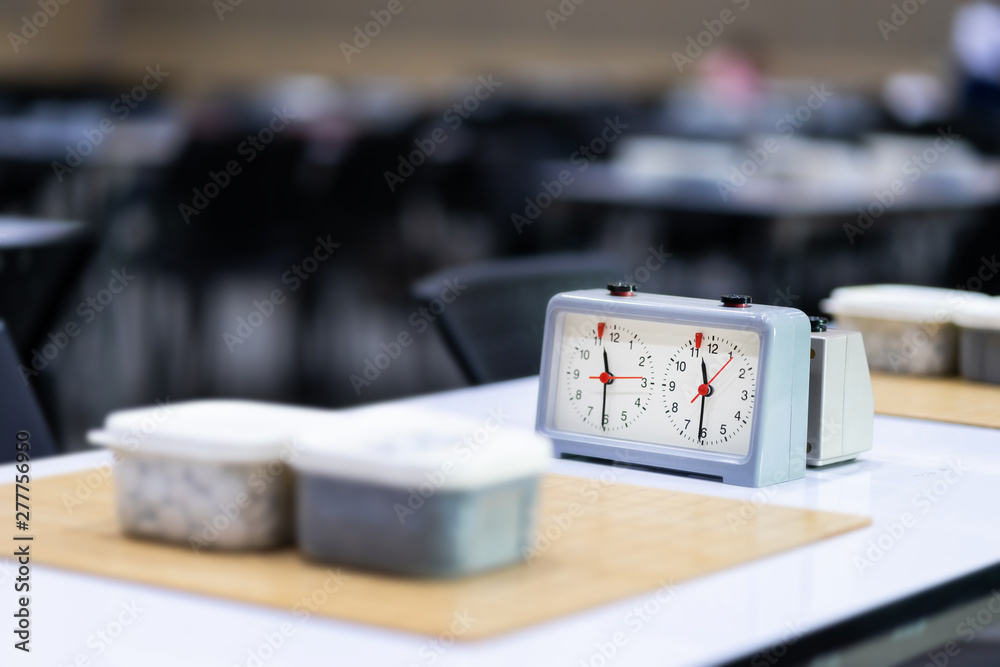 baduk clock - timer countdown clock with broad game on table Stock ...
