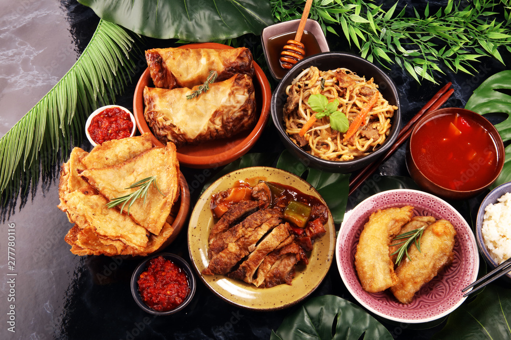 Assorted Chinese food set. Chinese noodles, fried rice, peking duck ...