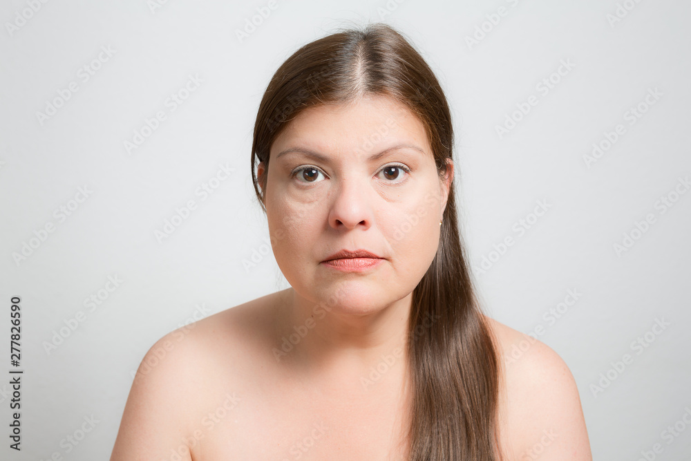 Loop lighting in studio portrait. Main light on one side of face and ...