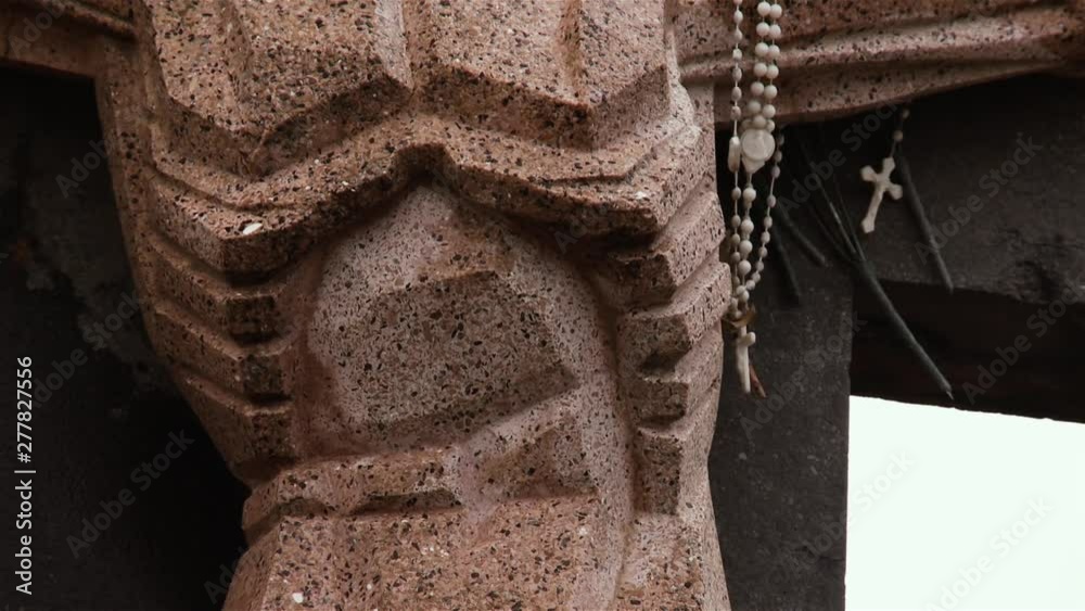 Christian Cross with Crucified Jesus Christ Statue and Many Rosaries. Abdomen Detail. vídeo do ...