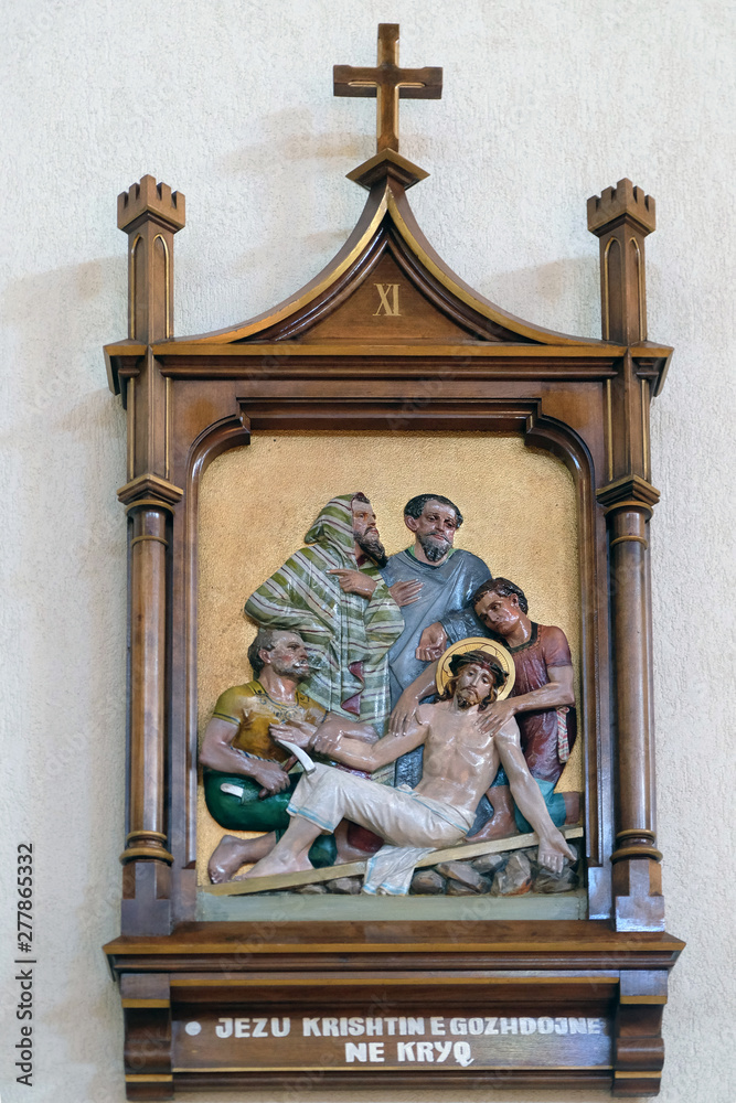 11th Stations of the Cross, Crucifixion: Jesus is nailed to the cross, Mother Teresa cathedral ...
