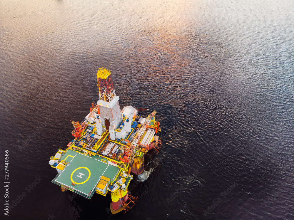Oil rig accident spill into sea, aerial top view. Concept ecological ...