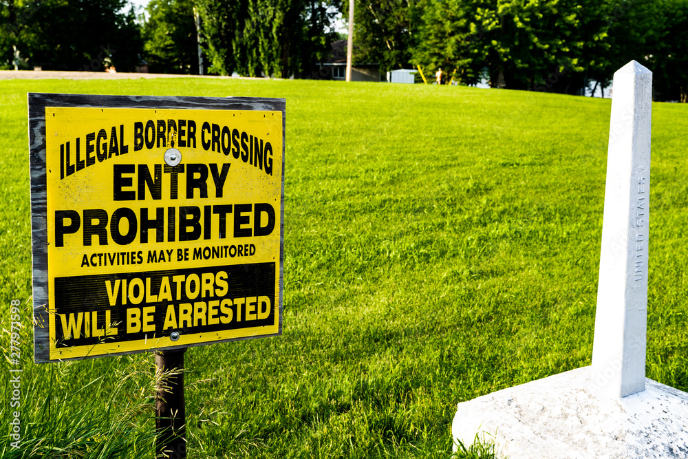 USA Canadian border marker monument with entry prohibited sign Stock ...