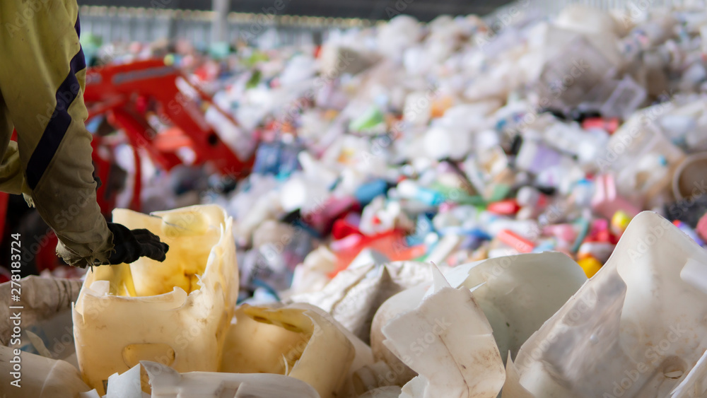 Workers are sorting plastic waste in the garbage factory Stock Photo ...