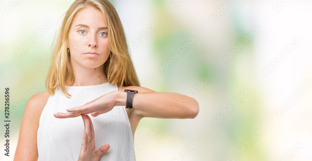 Beautiful young elegant woman over isolated background Doing time out ...