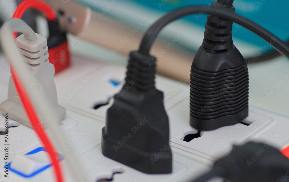 usb plug among electrical plugs socket for multiple port chargers ...