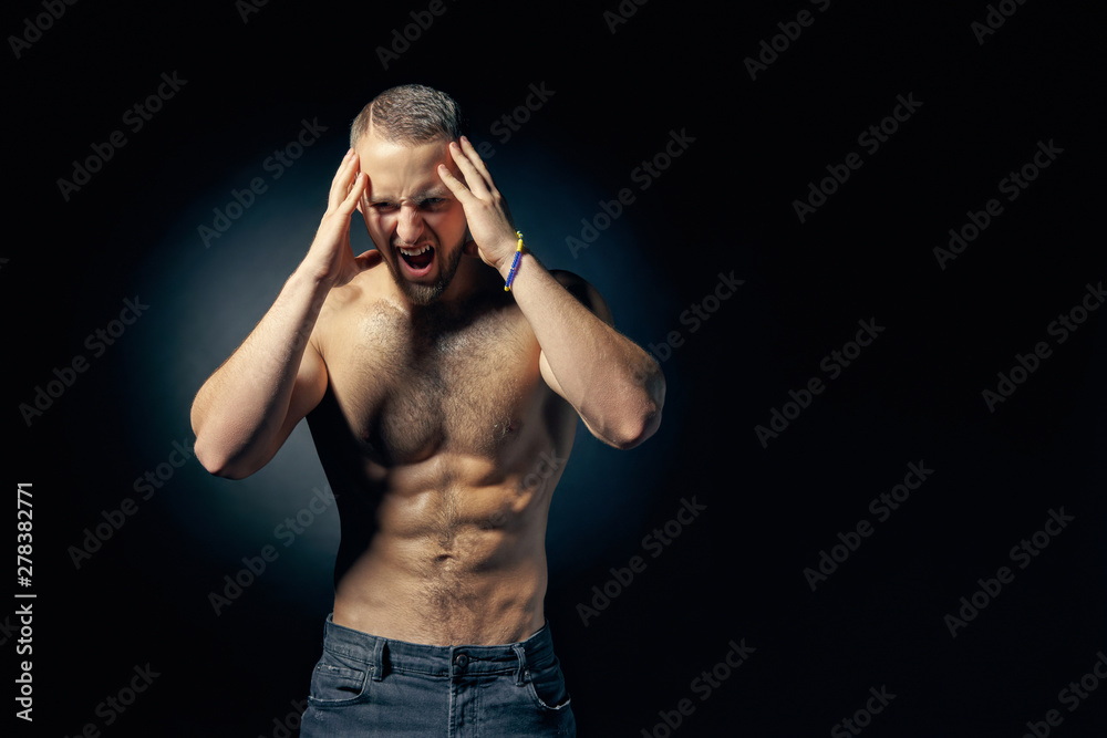 Muscular shirtless man screaming of angry Stock Photo | Adobe Stock