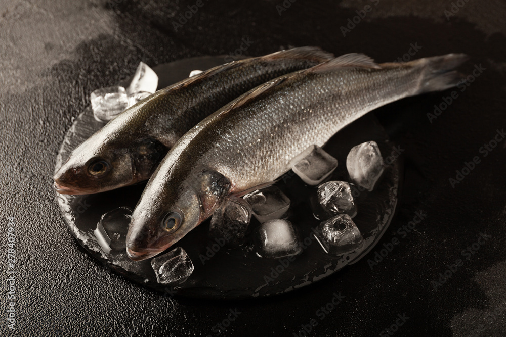 Fresh labrax on ice, raw sea fish. Protein and omega 3. Stock Photo ...