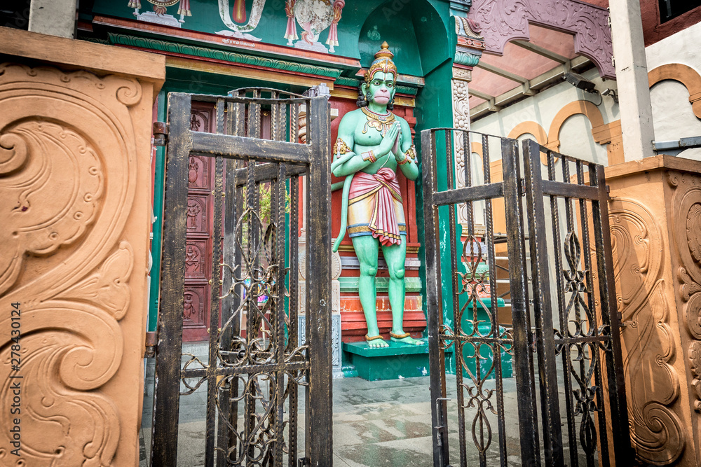 Open gates in front of the Hanuman Hindu green monkey god sculpture ...