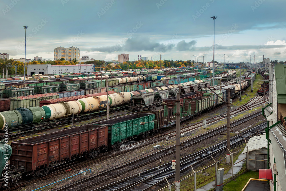 Tanks and cargo carriages on freight railway station Stock Photo ...