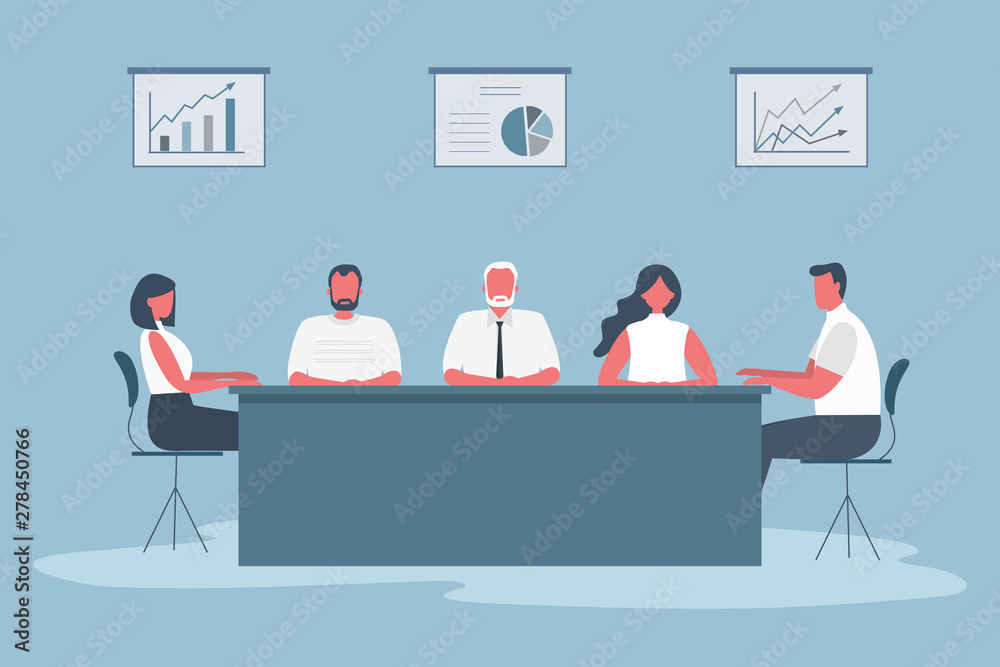 Office workers during the meeting. Employees are sitting at the table ...