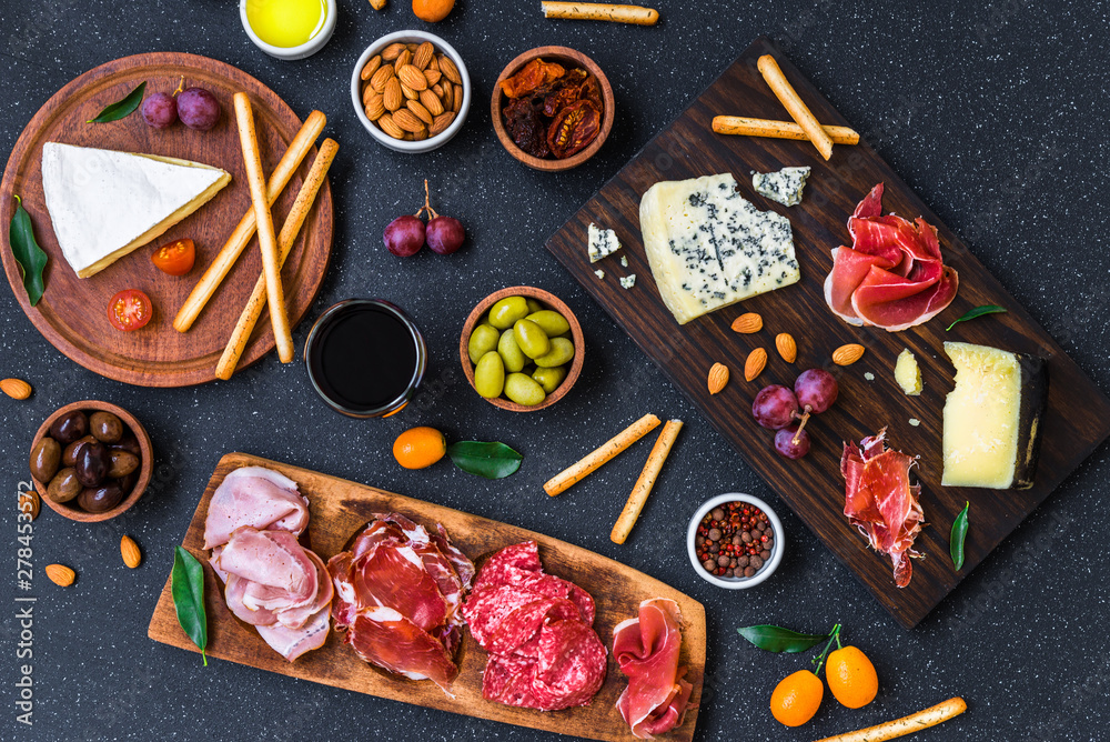 Table of Italian food antipasti starters and appetizers with cold meats ...