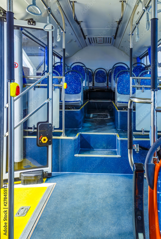 Bus inside, city transportation white interior with blue seats in row ...