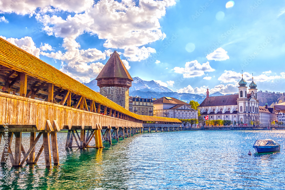 Ancient covered wooden Chapel Bridge Kapellbrucke and Water Tower ...