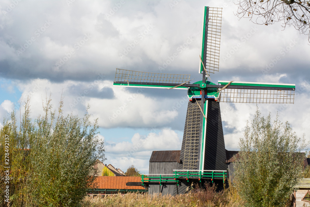 Classic dutch windmill in the summer day in the Netherlands with the ...