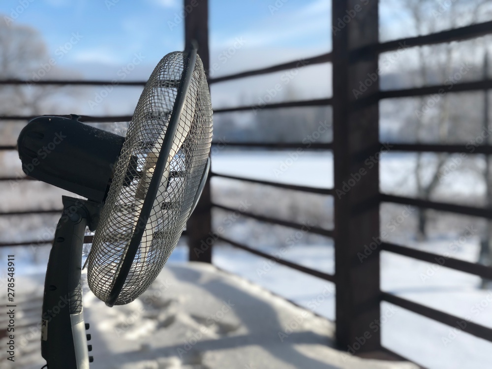 incongruous things: gray ventilator stands on the balcony in the power ...