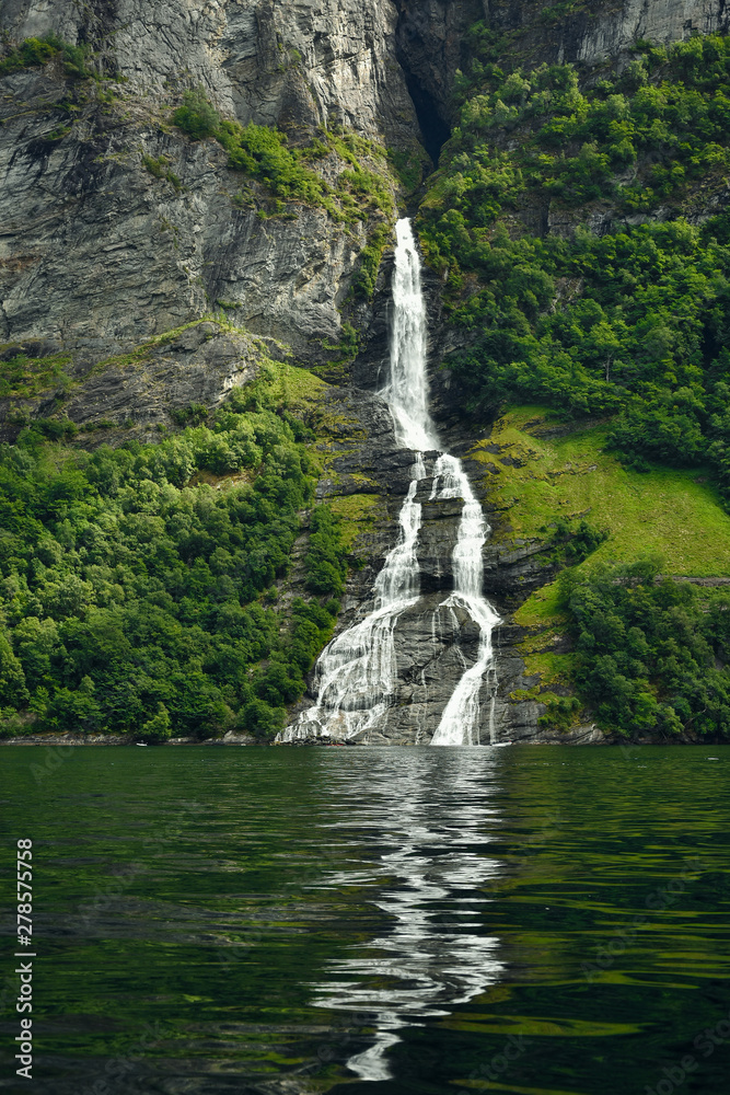 The Seven Sisters unique waterfall at Geirangerfjord seens by boat trip ...