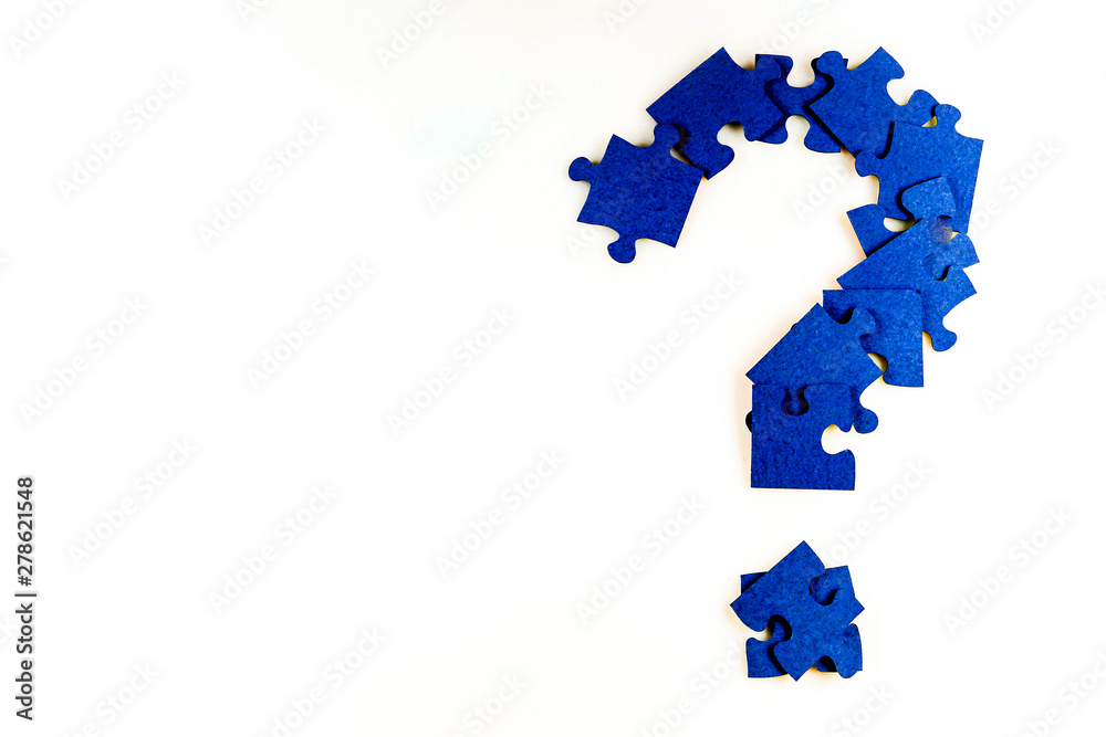 Puzzle in the shape of a question mark on a white isolated background ...