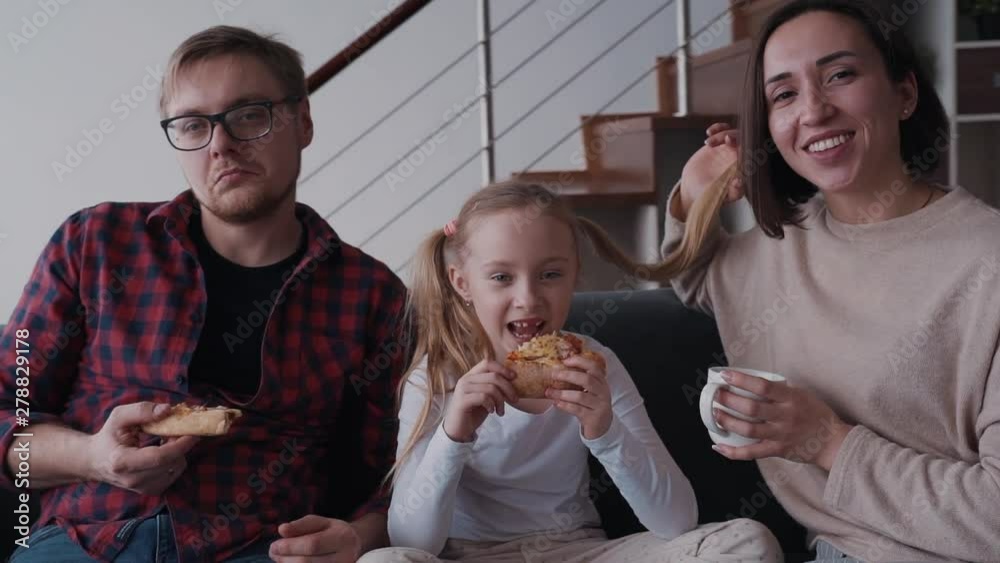 Vídeo do Stock: Family of three happy person sitting on comfort couch ...